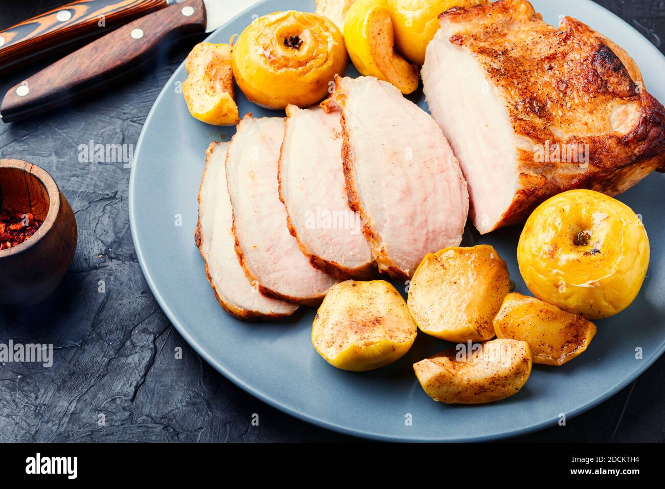 Baked meat with apples.Fried pork loin stuffed with apple Stock Photo ...