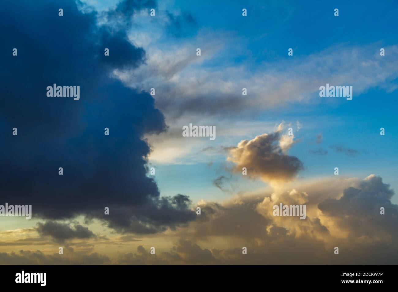 Dark cloud in the shape of a witch against a blue sky Stock Photo - Alamy