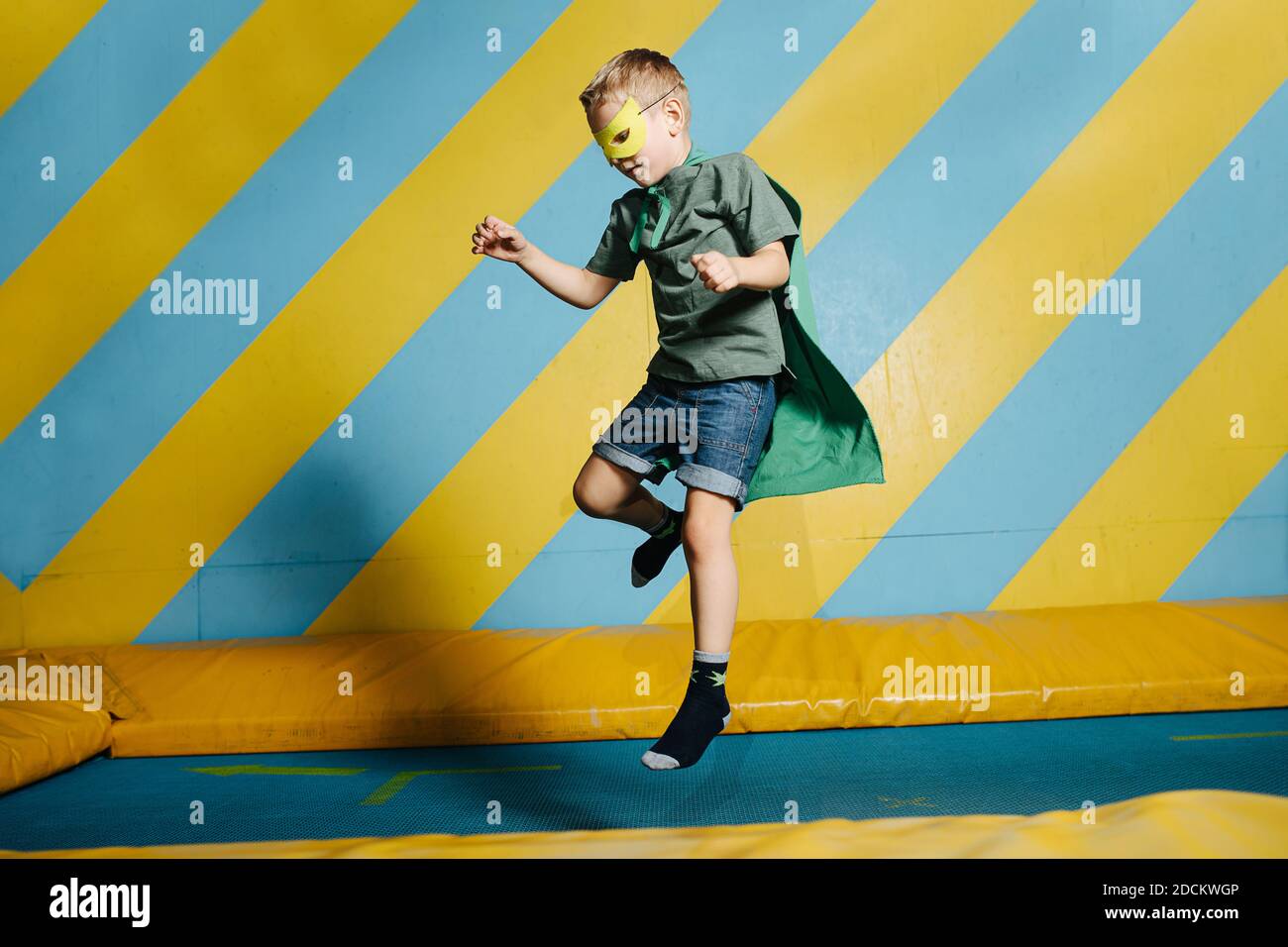 Old person and child on trampoline hi-res stock photography and images ...