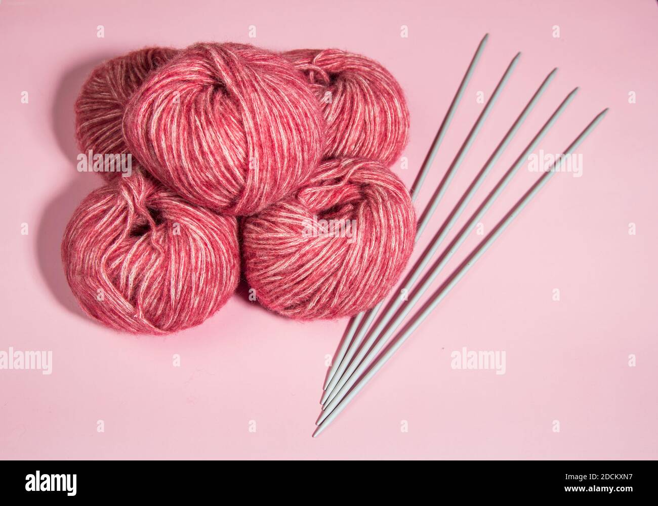 Colorful yarn balls over white background Stock Photo - Alamy