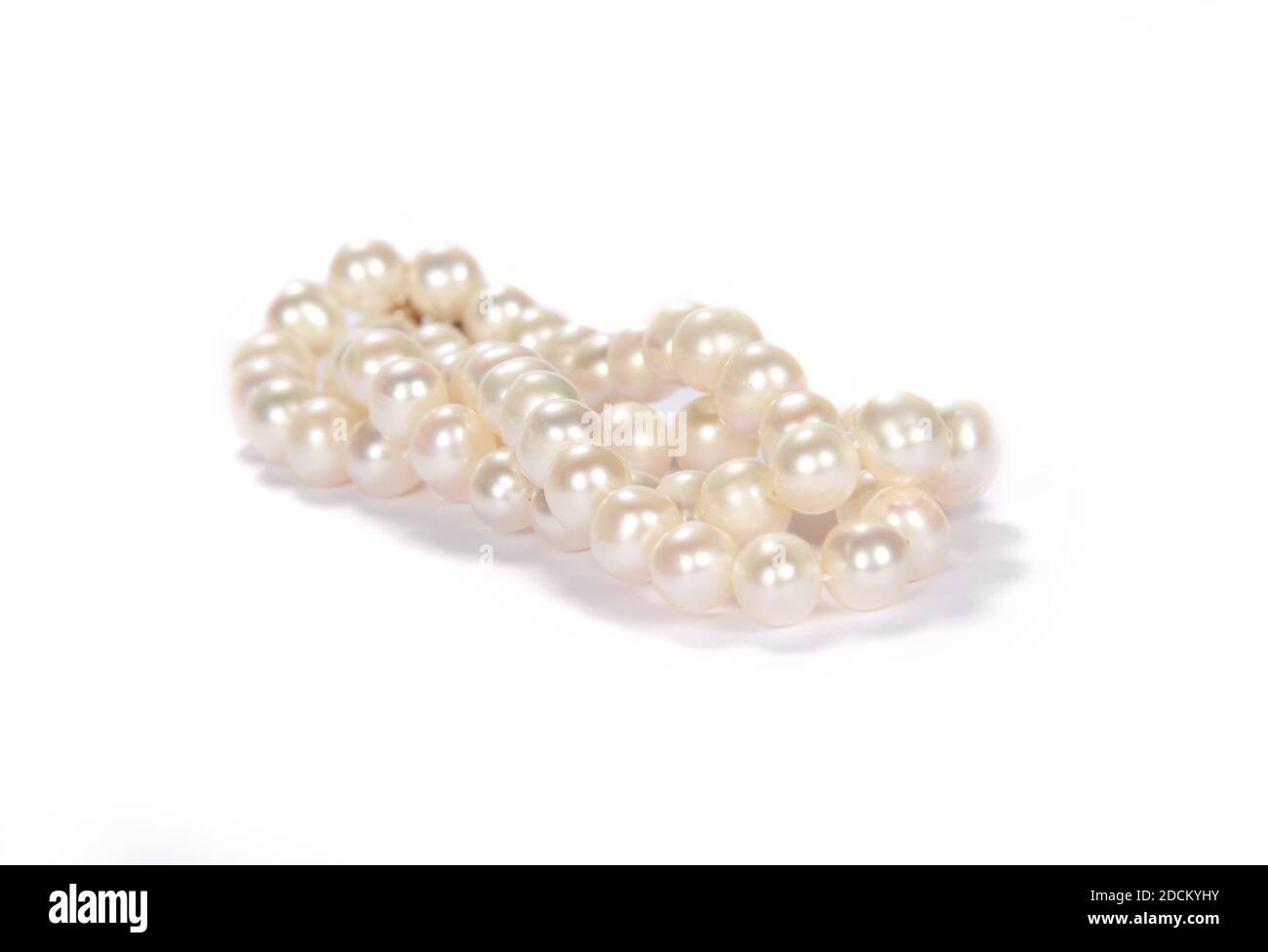 A necklace of white pearls isolated on a white background Stock Photo ...