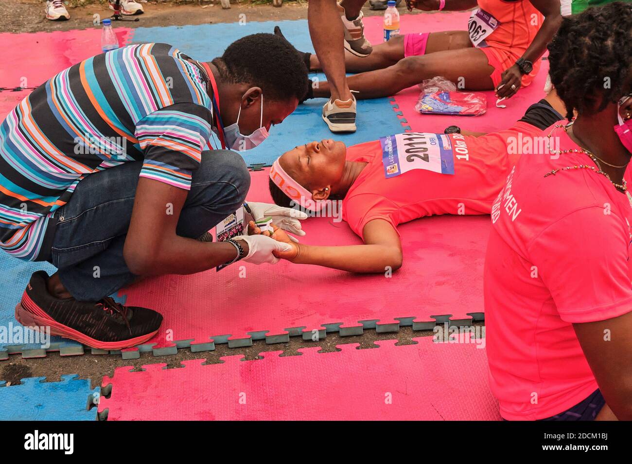 Exhausted runner finish hi-res stock photography and images - Alamy