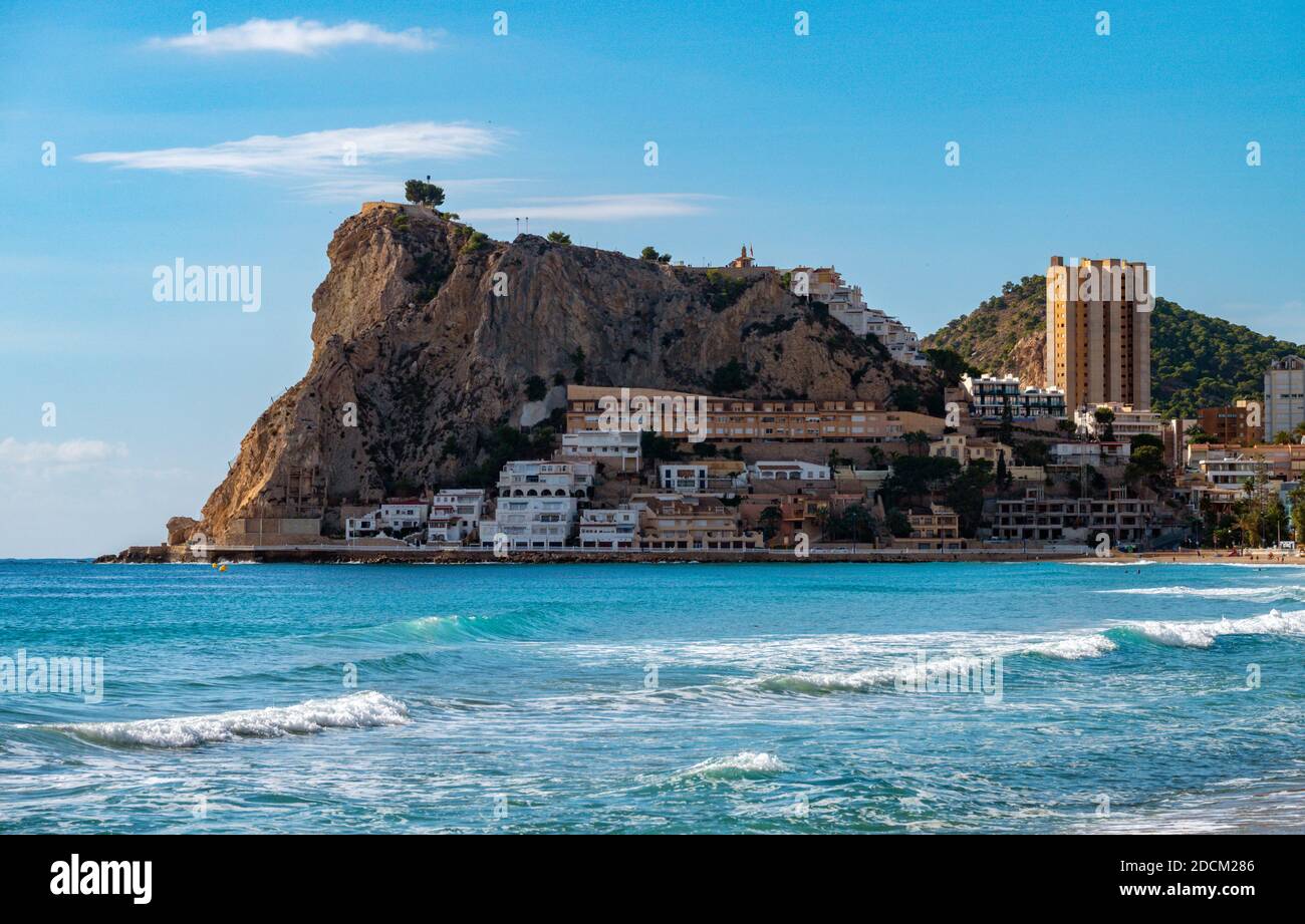 The hill of Tossal de la Cala above the popular holiday destination and ...
