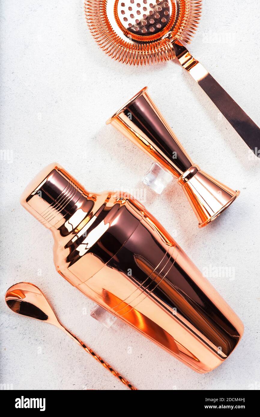 Copper bar tools and accessories for making cocktail. Shaker, jigger ...