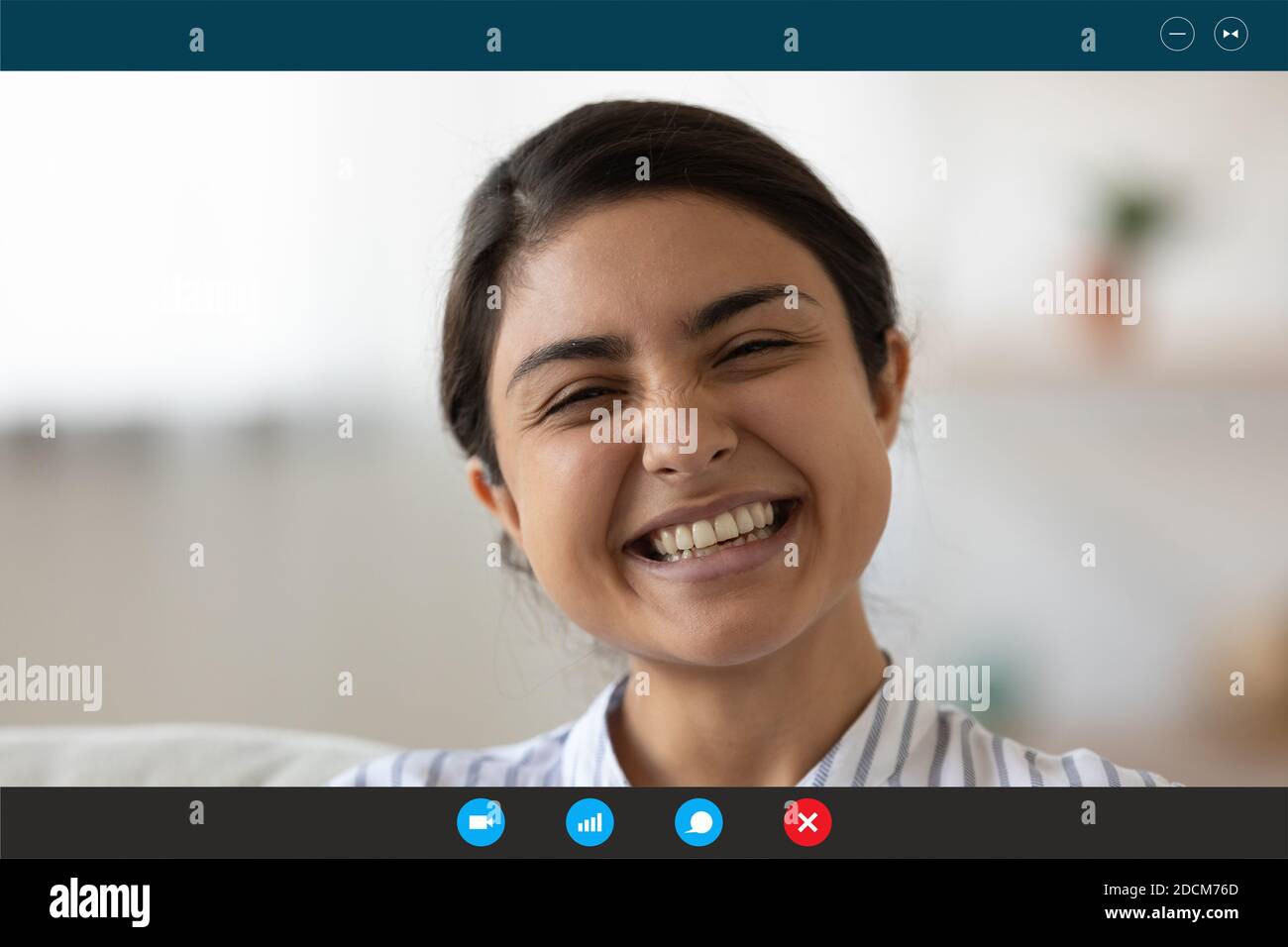 Young indian woman involved in funny distant video call talk Stock ...