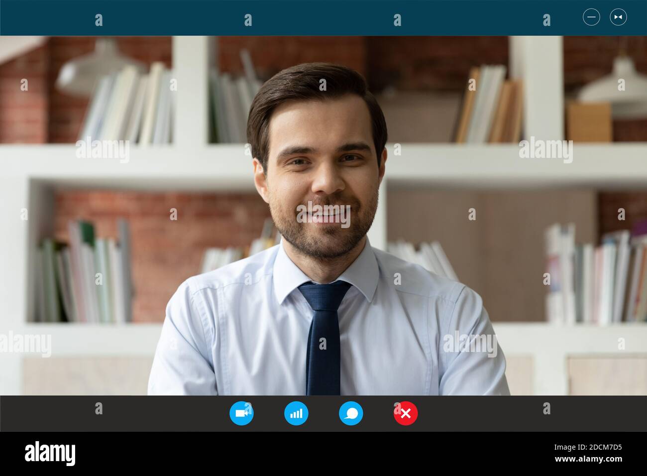 Smiling young successful businessman holding video call online meeting ...