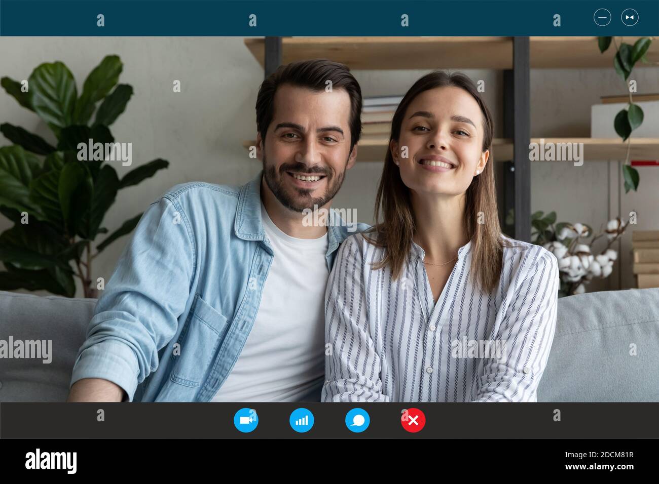 Happy young married family couple holding video call conversation Stock ...
