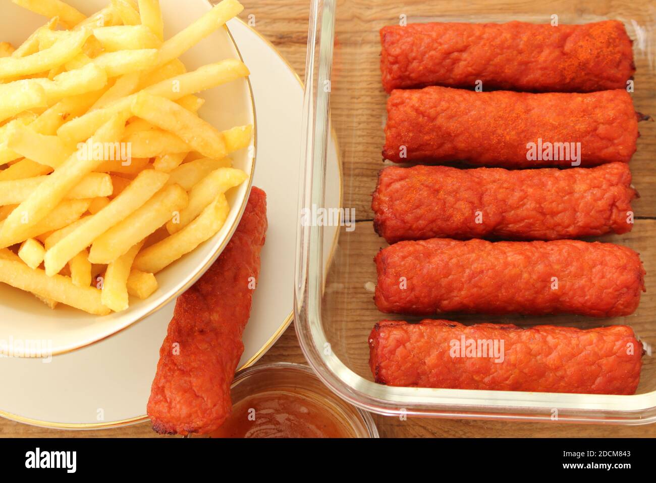 delicious french fries with cevapcici rolls and dip Stock Photo - Alamy
