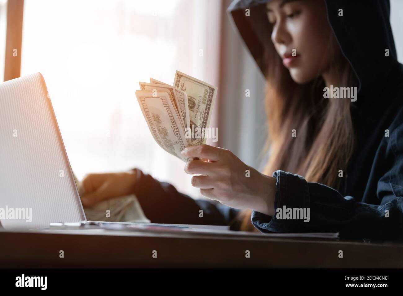 Hacker asia woman stealing data success from online computer systems by ...