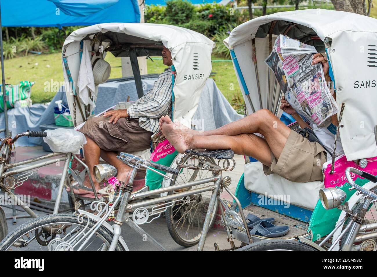 Rickshaw drivers taking a rest in Hua Hin. This is an old fishing ...