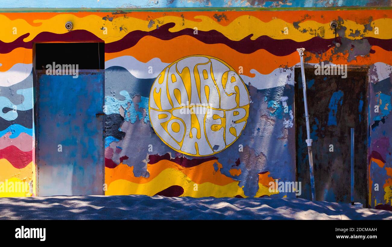 Matala, Greece - August 14, 2020 - A building in Matala painted by ...
