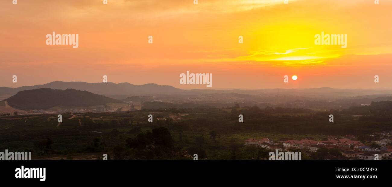 Golden light during sunset on top of the hill Stock Photo - Alamy