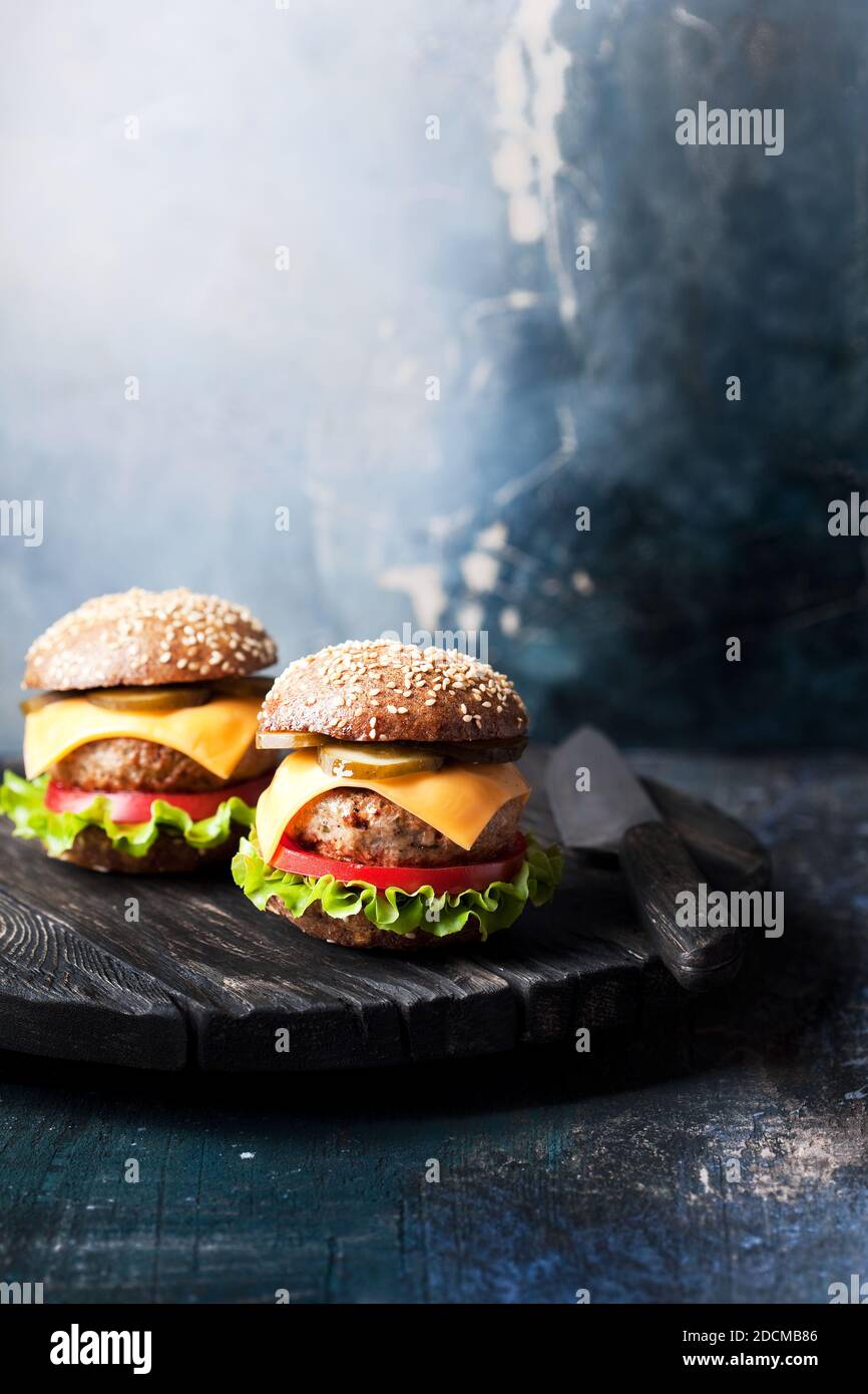 Healthy cheeseburger with whole wheat bun, selective focus Stock Photo ...