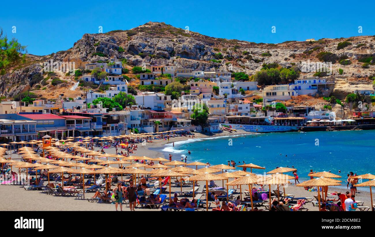 Matala, Greece - August 14, 2020 - Vacationers relax on Matala Beach on ...