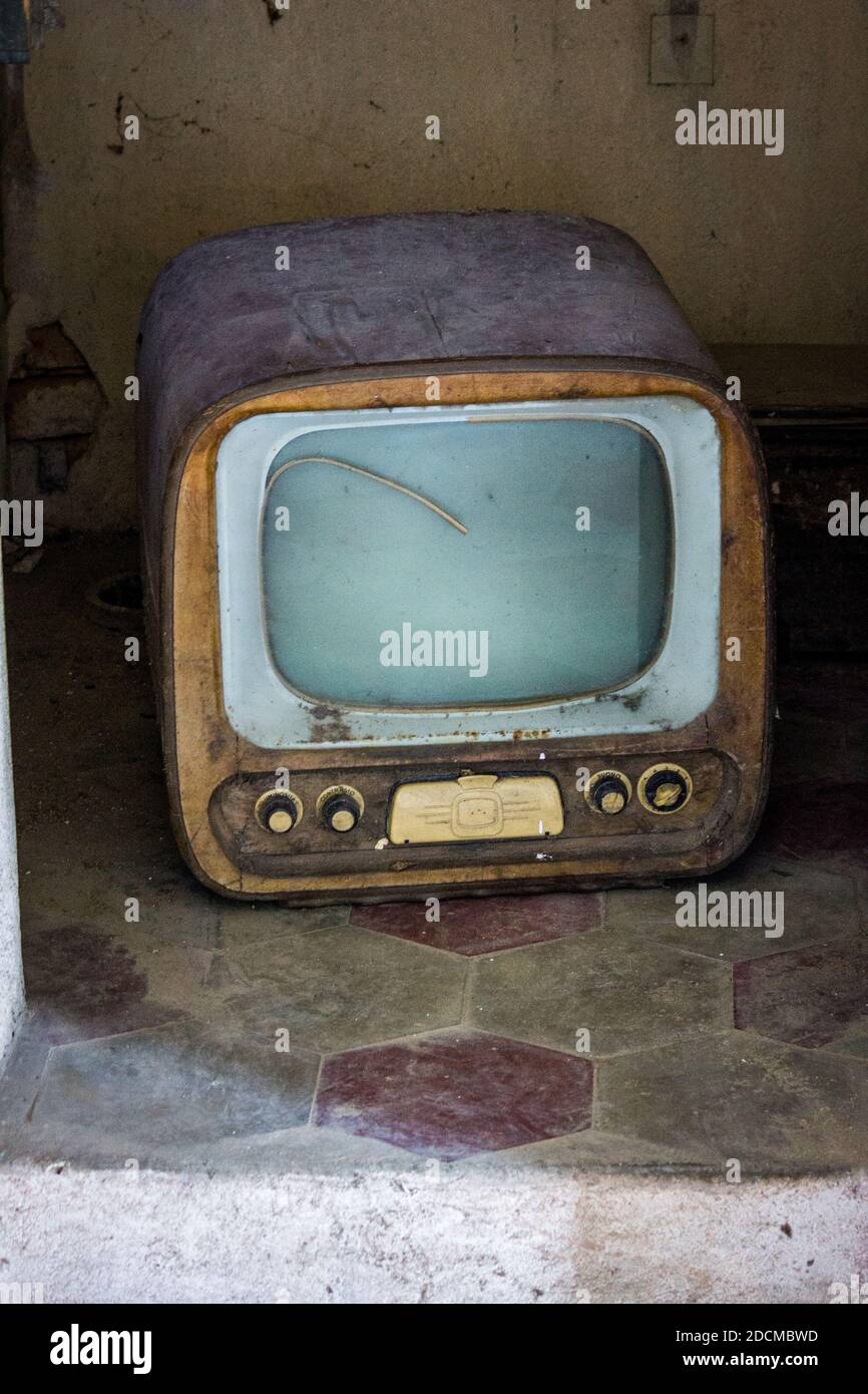 Picture of an Abandoned vintage television without remote control Stock ...
