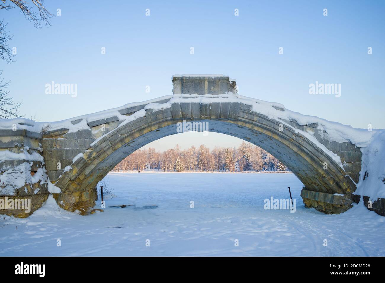 Arch of the old Humpbacked Bridge close up on a frosty January evening ...