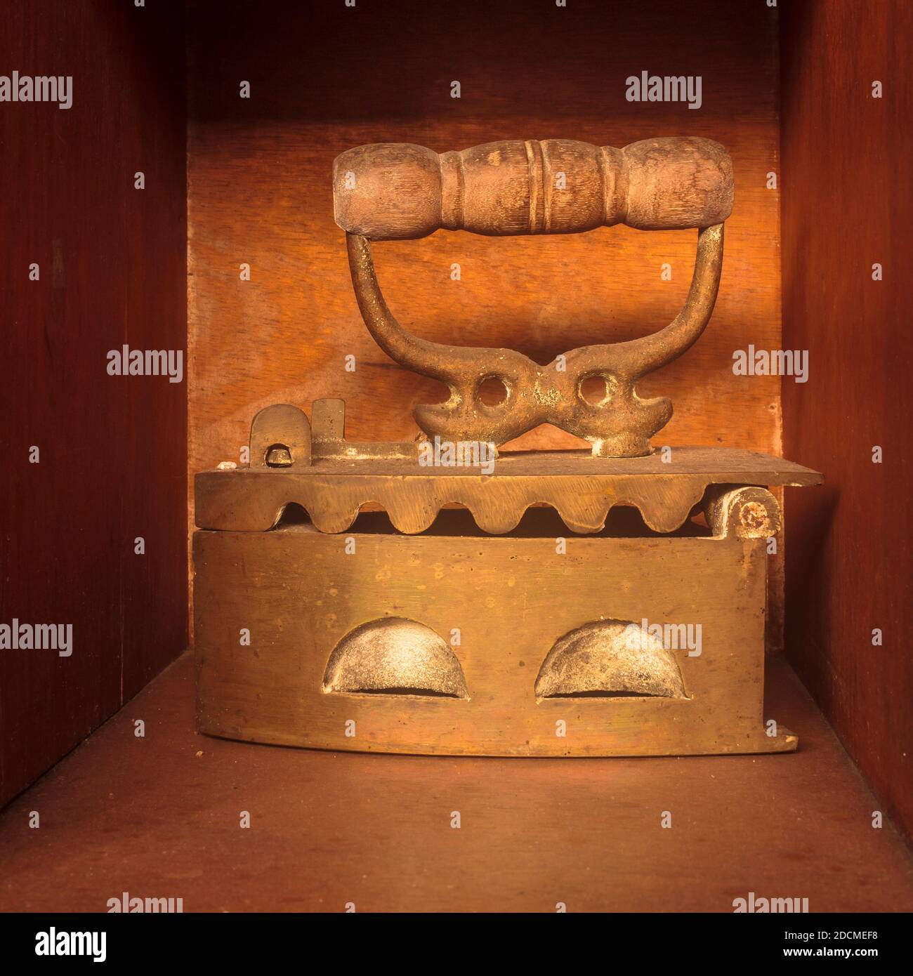An old iron used in ironing clothes in the 80's Stock Photo - Alamy