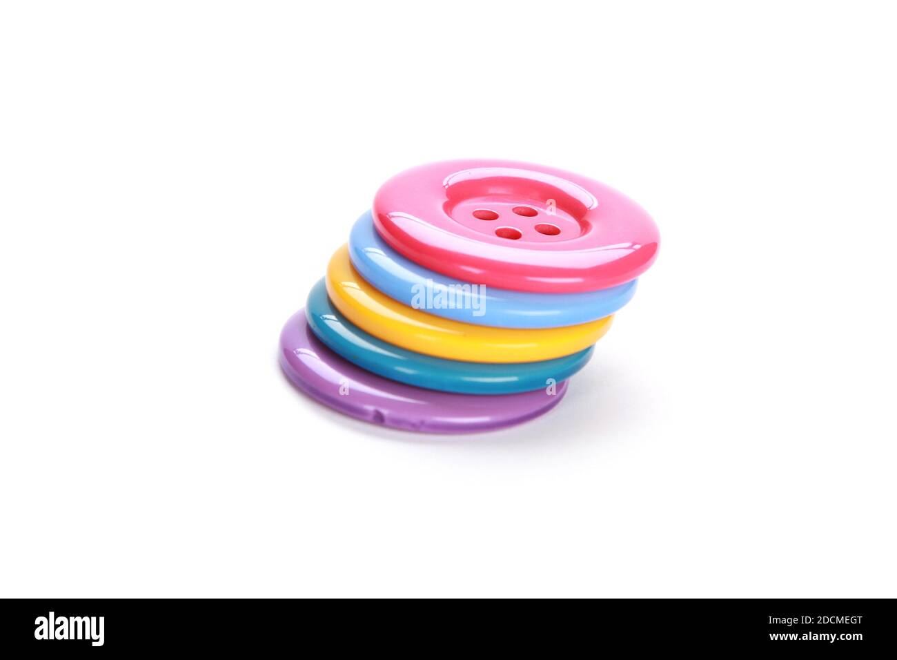 A stack of colorful sewing buttons isolated on white background Stock ...