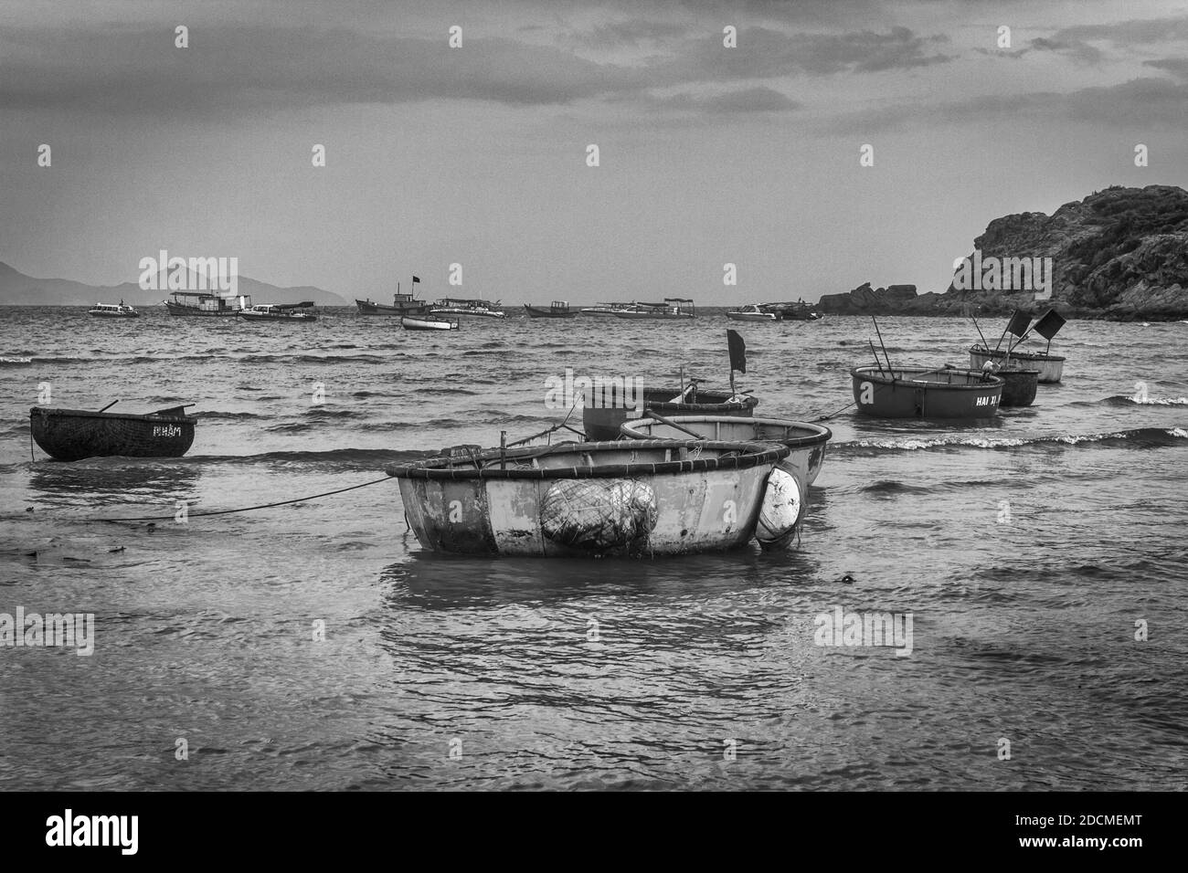 Circular fishing vessels at the beach in Nhon ly village Stock Photo ...