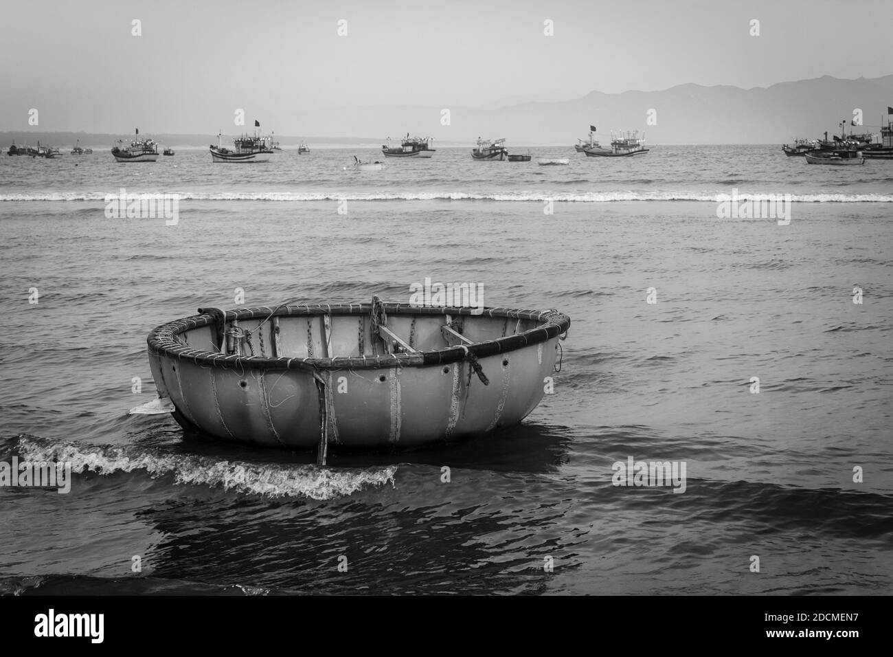 Circular fishing vessels at the beach in Nhon ly village Stock Photo ...