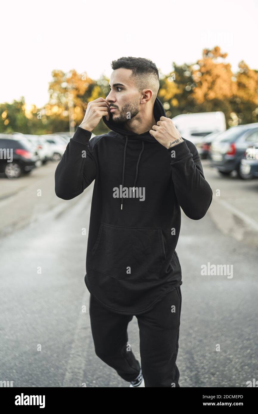 A street style of a European elegant man with a stylish haircut and ...