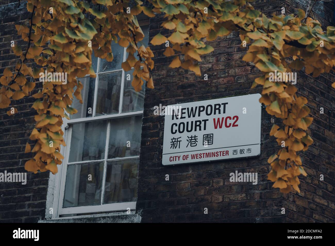 London, UK - November 19, 2020: Street name sign in English and Chinese ...