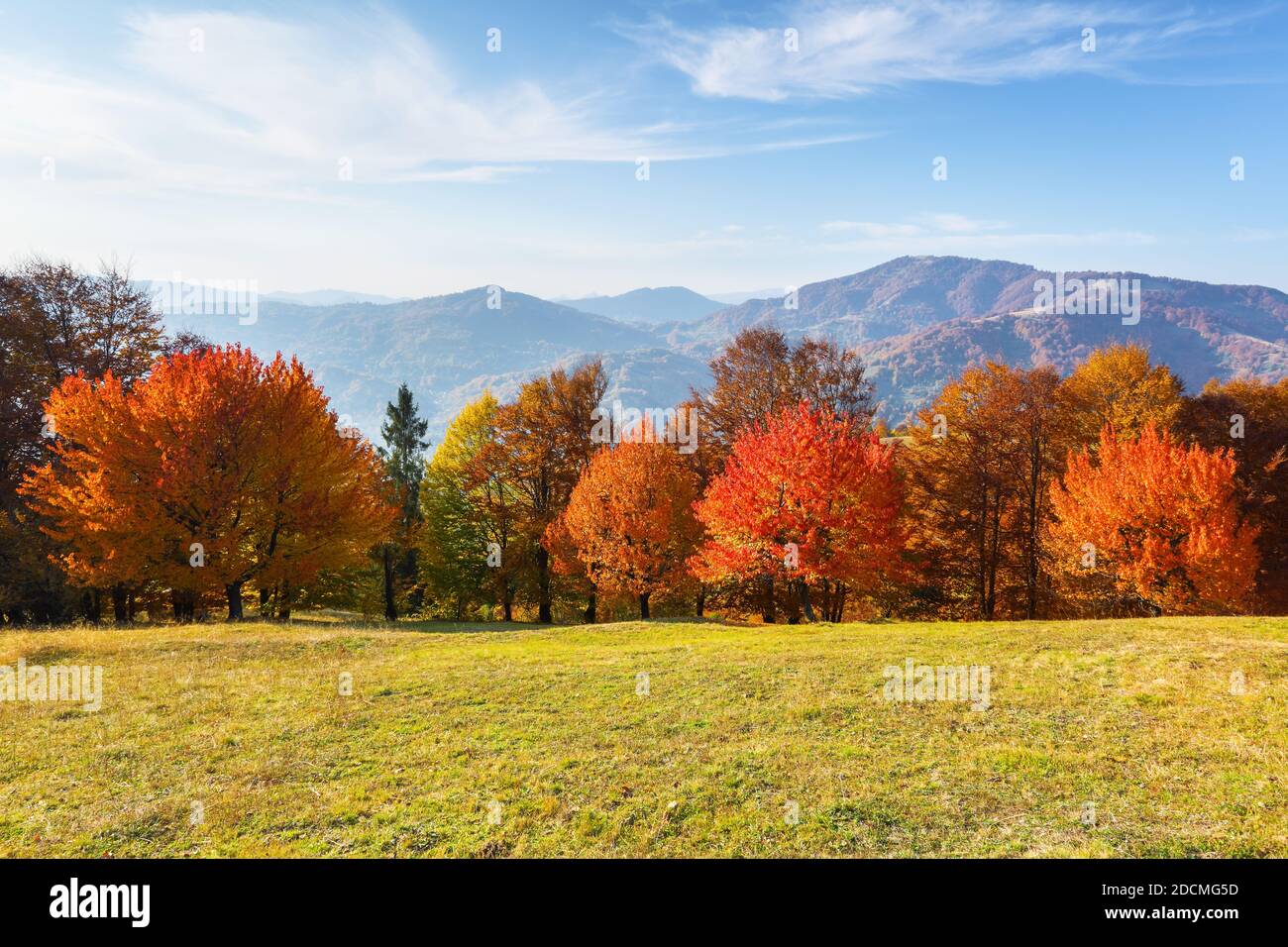 Autumn scenery. Landscape with amazing mountains, fields and forests ...