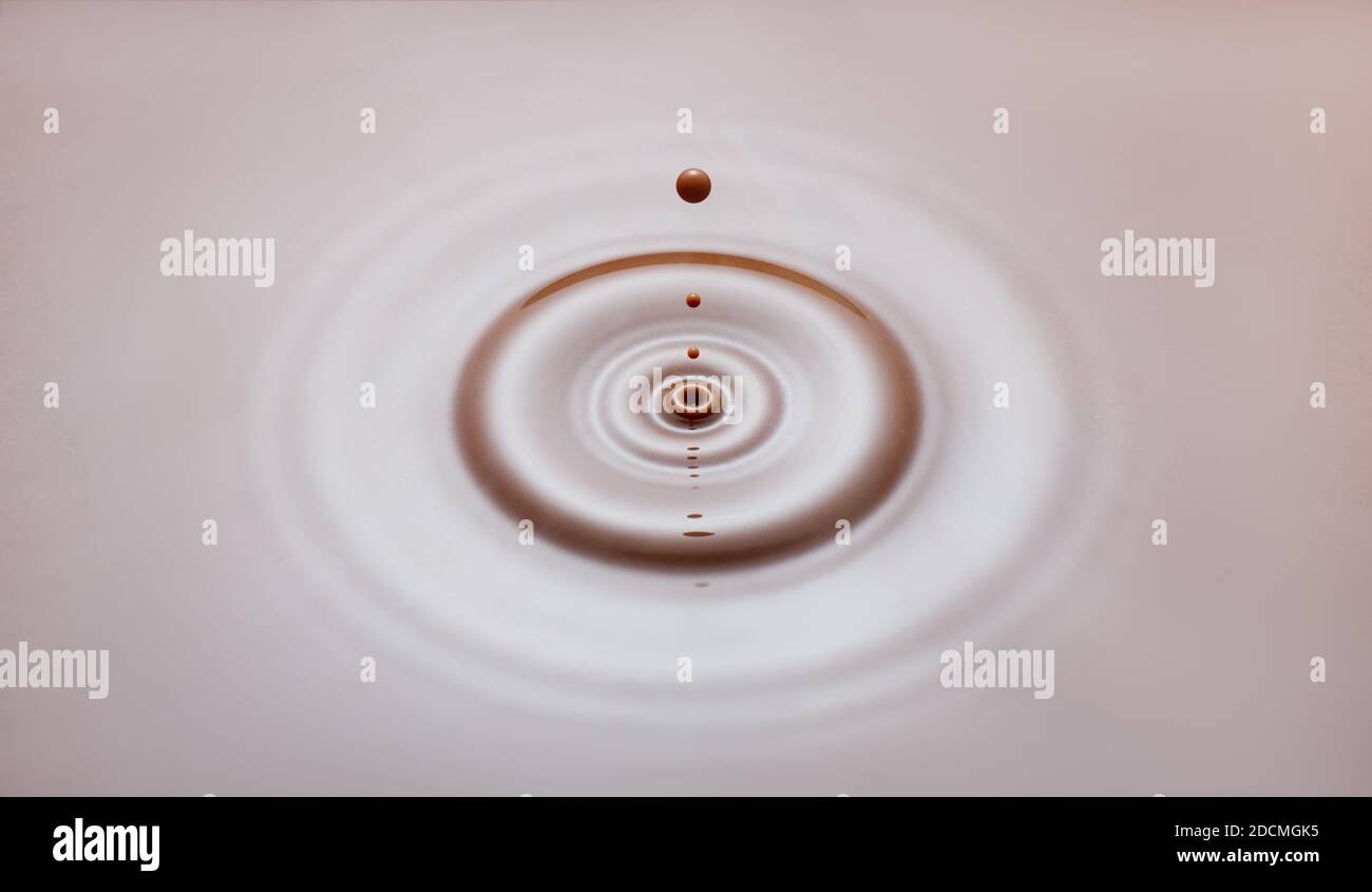 drop created splash with circle ripple Stock Photo - Alamy