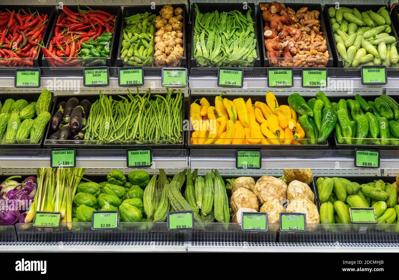 Variety of vegetables on display in a grocery store Stock Photo - Alamy