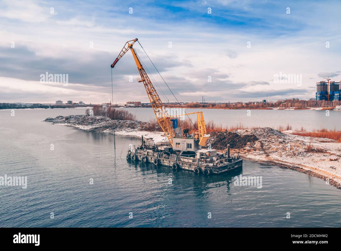 Old floating crane. Huge floating crane at work Stock Photo - Alamy