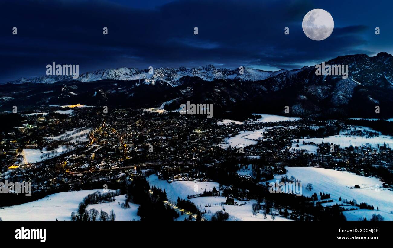 Mountains at winter night, aerial view. Magical winter, Christmas ...
