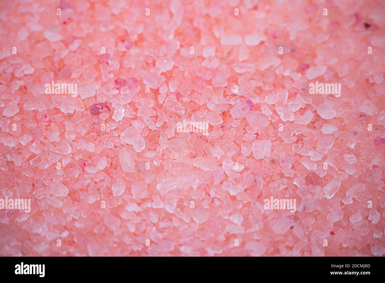 Macro photography of pink salt. Pink background Stock Photo - Alamy