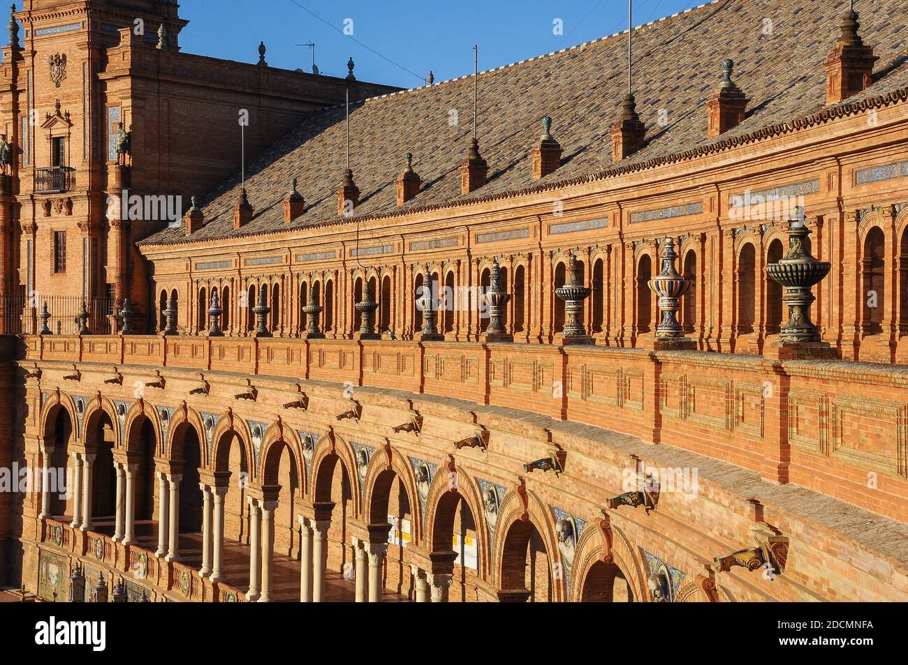 Beautiful arcades at the Plaza de España (Spain Square) in Seville ...