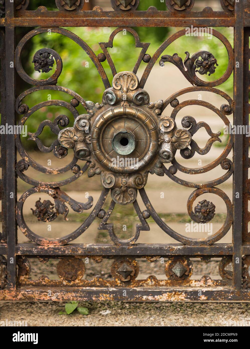 Part of vintage cast iron gate Stock Photo - Alamy
