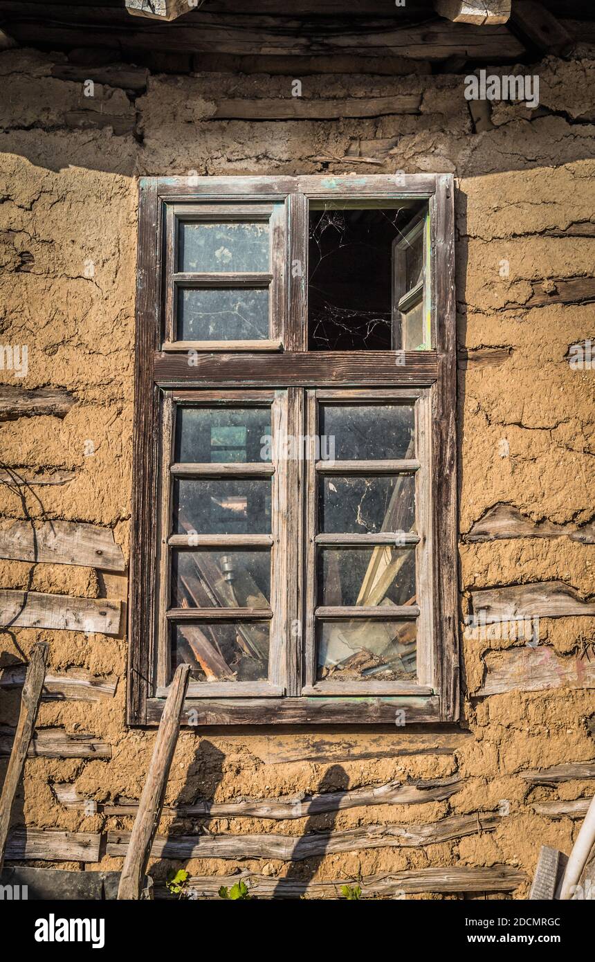 Old mud house, rusty window, HDR effect Stock Photo - Alamy