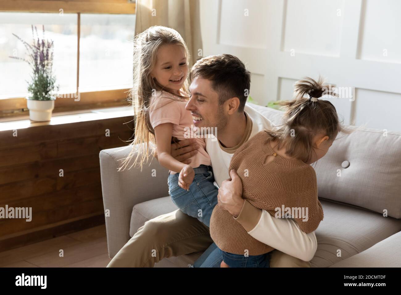 Dad with two daughters hi-res stock photography and images - Alamy