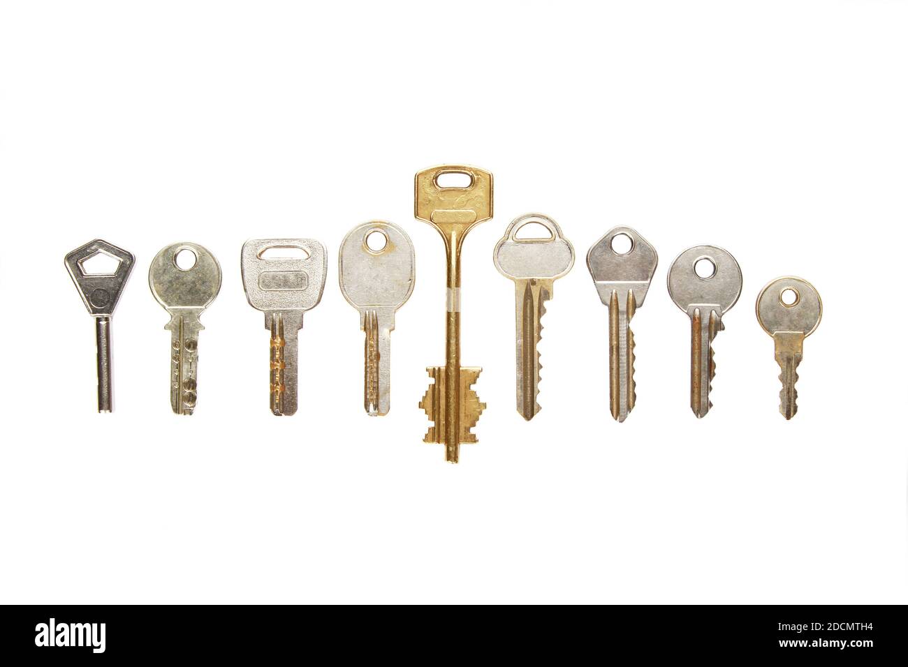 A collection of keys isolated on a white background Stock Photo - Alamy