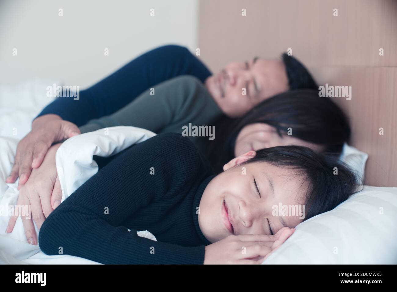 Pretty mother sleeping daughter hi-res stock photography and images - Alamy