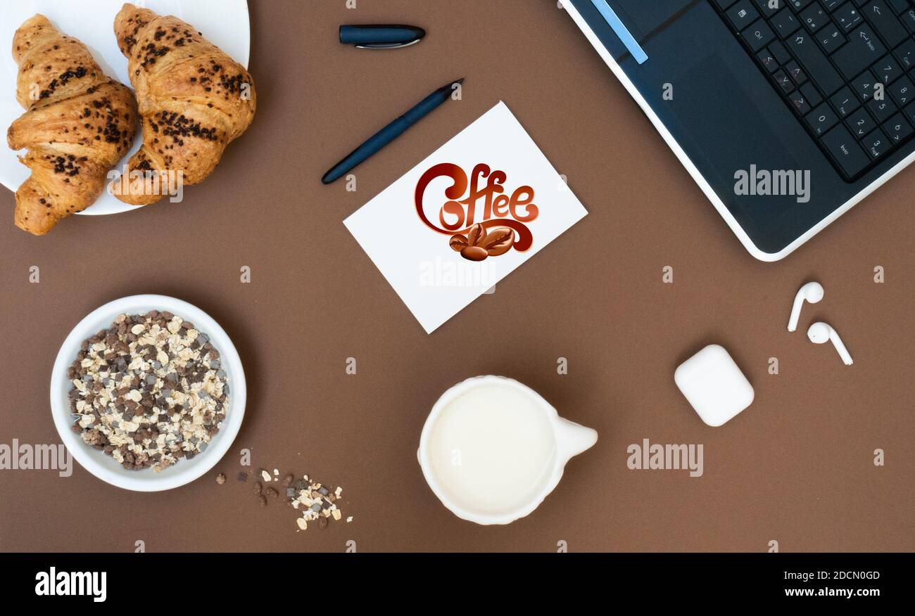 Business breakfast in office with coffee and croissant on white table ...