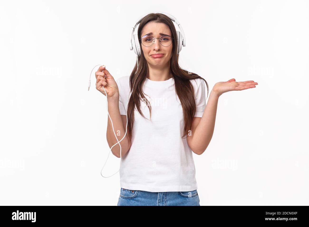 Technology, lifestyle and music concept. Portrait of awkward and ...