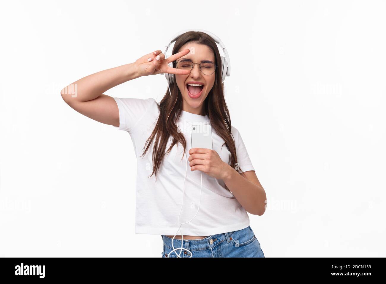 Girl vibing with headphones hi-res stock photography and images - Alamy
