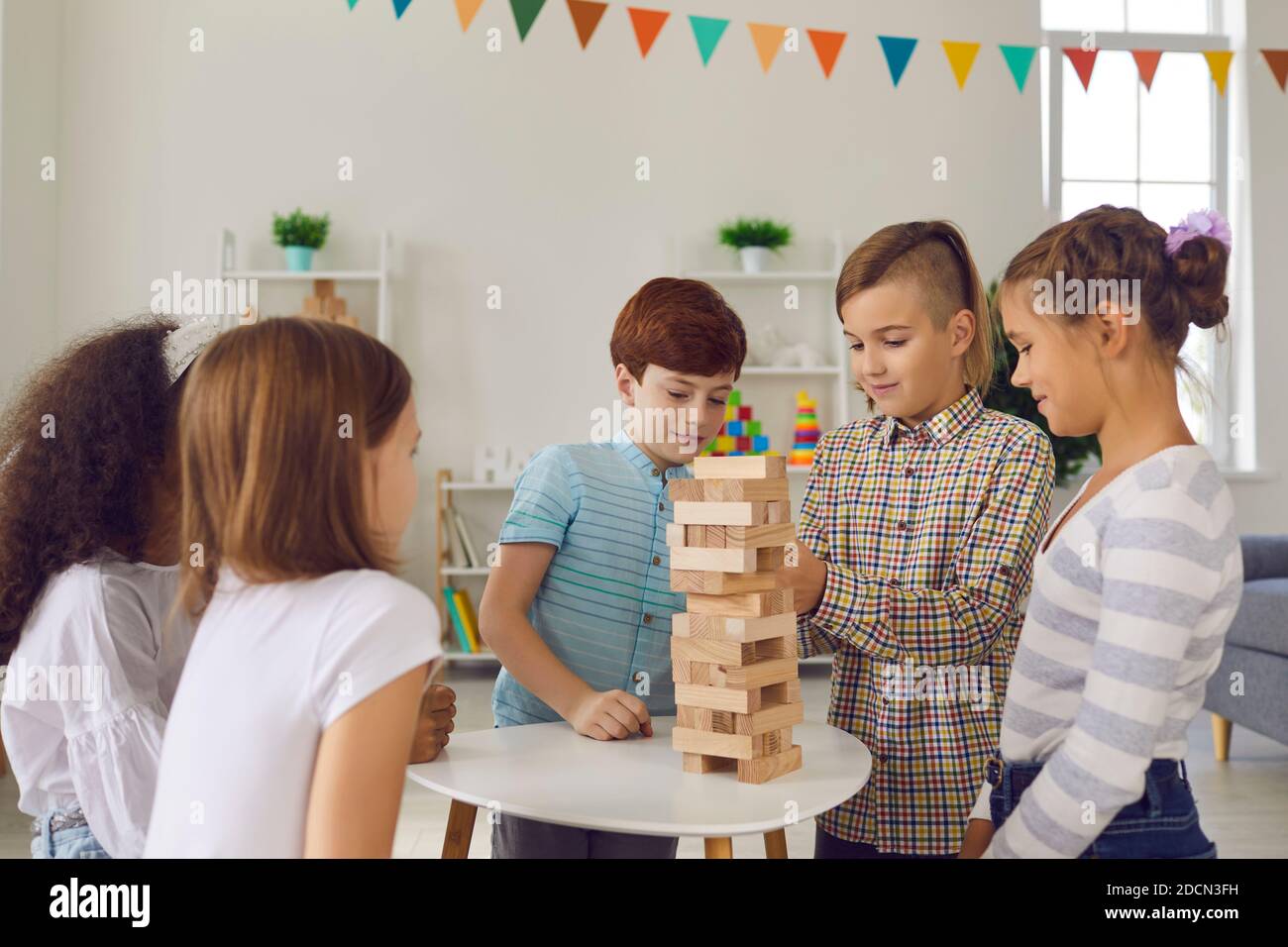 Block tower building children hi-res stock photography and images - Alamy