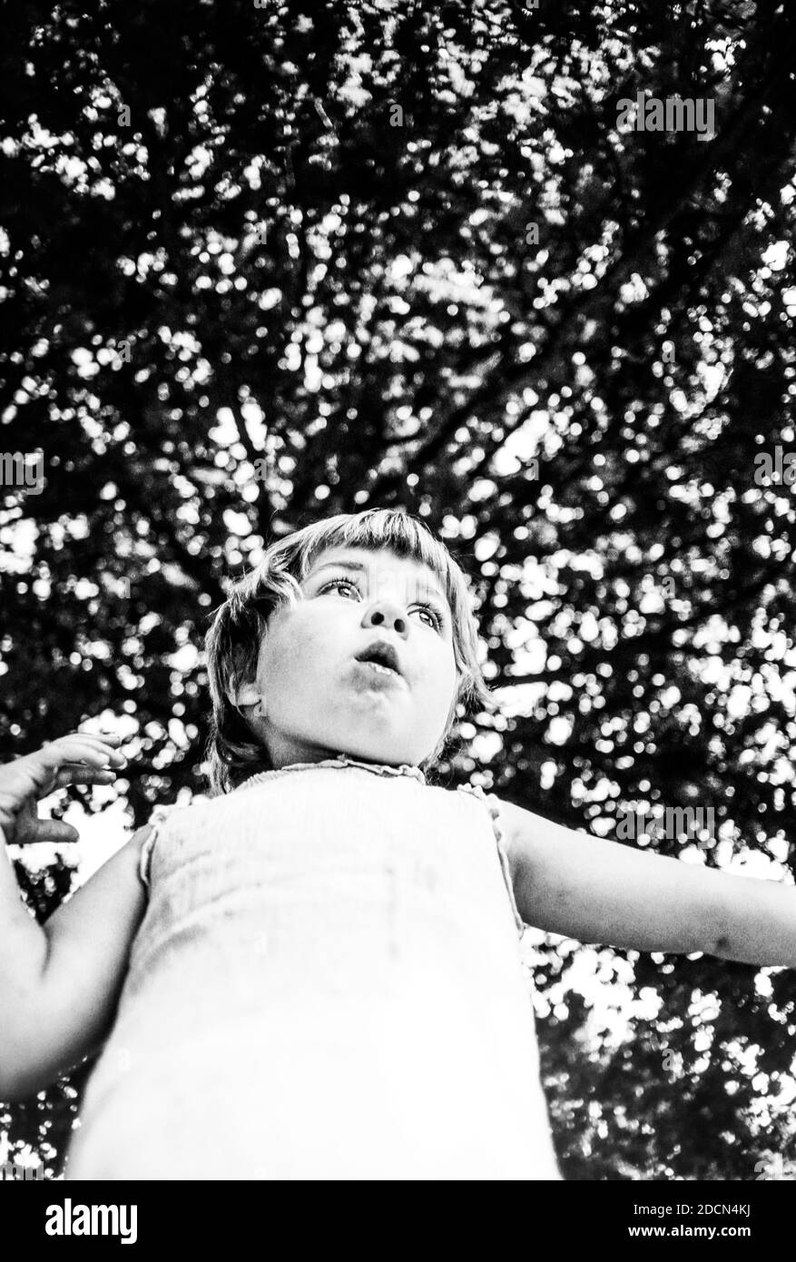 Girl from below hi-res stock photography and images - Alamy