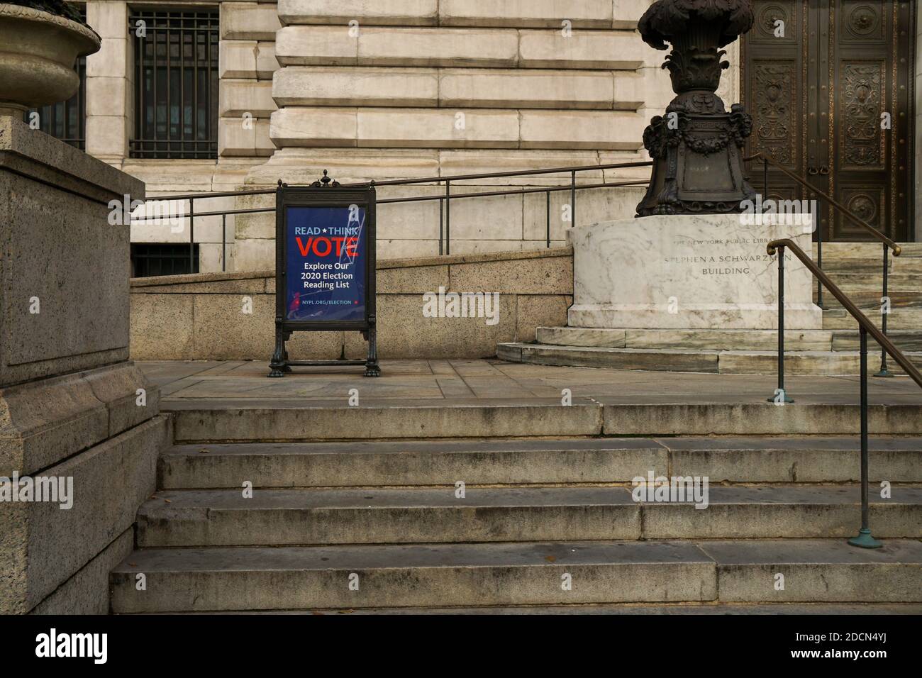 NEW YORK - October 17, 2020: steps on side of N.Y.P.L. with a sign for ...