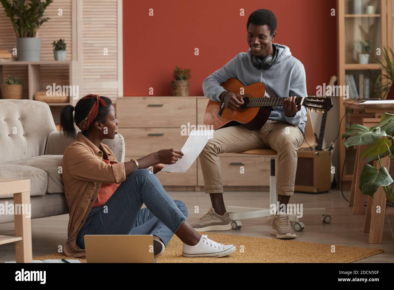 Full length portrait of two young African-American musicians playing ...