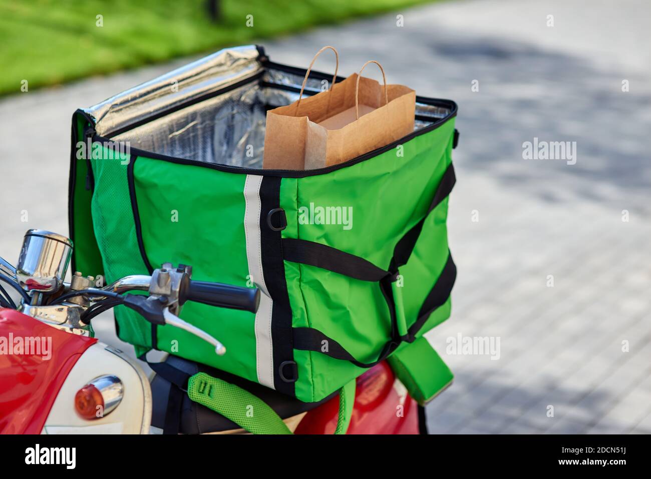 Green delivery thermo backpack with food on scooter. Delivery services ...