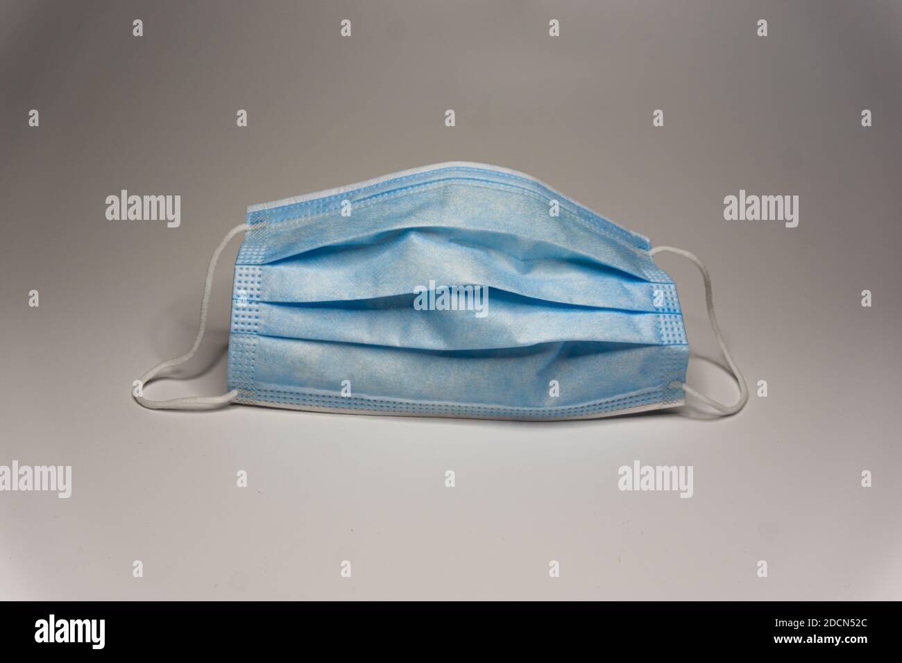 blue mask on a white background Stock Photo - Alamy