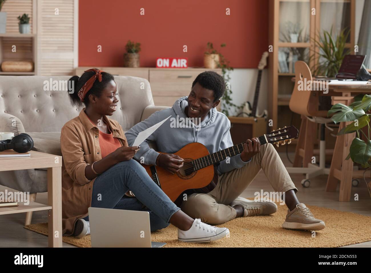 Full length portrait of two young African-American musicians playing ...