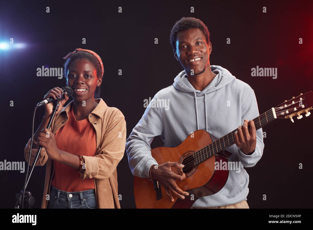 Boy singing on stage hi-res stock photography and images - Alamy