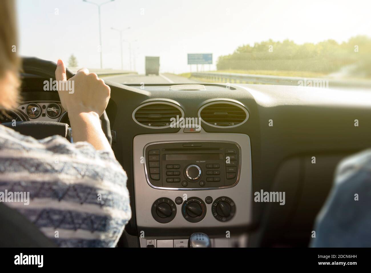 Girl behind steering wheel hi-res stock photography and images - Alamy